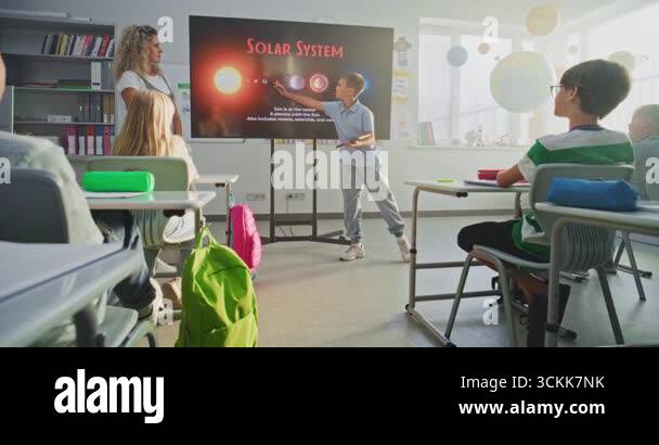 Primary School Boy with Tablet Computer Showcasing Knowledge of ...