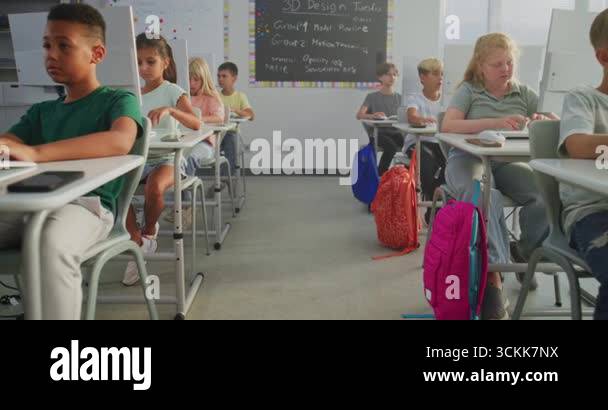 Elementary School Children Using Computers, Doing Creative 3D Design Projects. Smart Young Boys ...