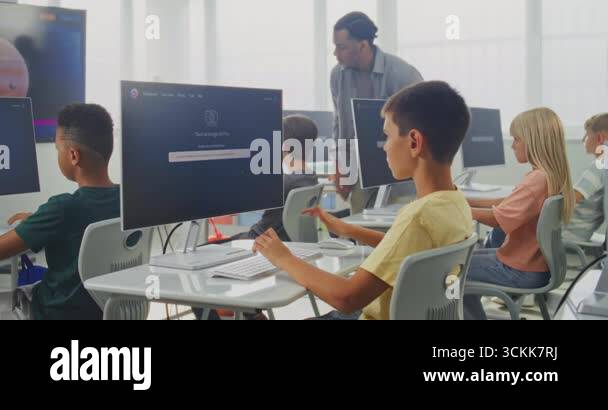 Elementary School Children Using Computers, Creating Digital ...