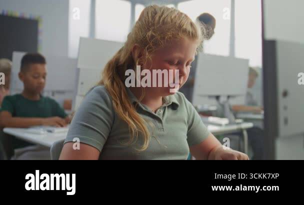 Young Girl Working on Creative Project on Computer. Primary School ...