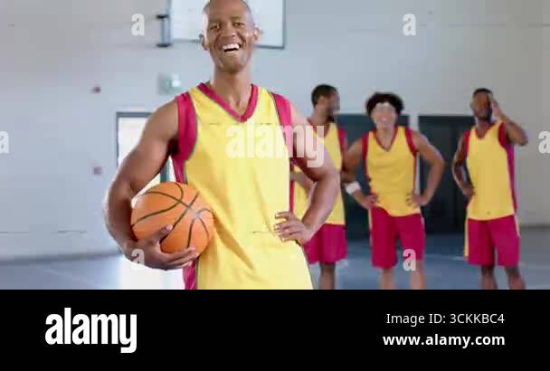Static glitch revealing basketball player smiling with teammates on ...