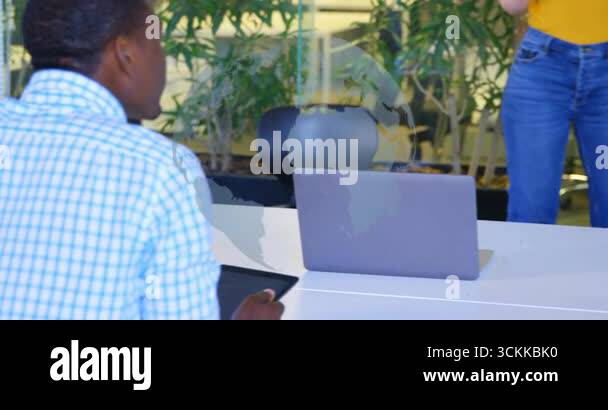 Female presenter entering business meeting picking marker pointing ...