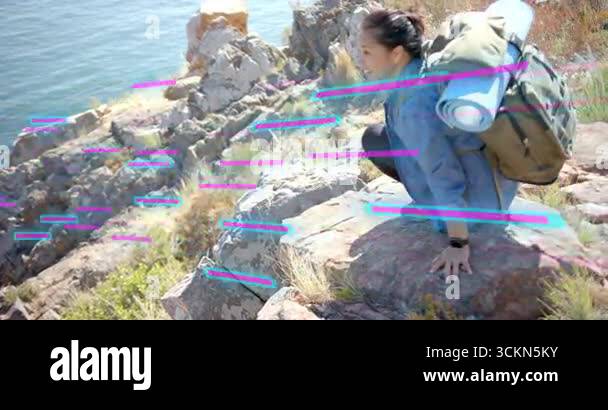 Adventure travel hiker arriving coastal cliff, pushing off rock ...