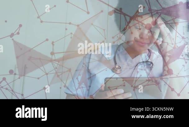 Clinician lifting tablet and scrolling data, rubbing forehead while ...
