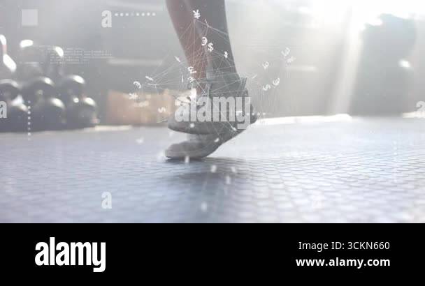 Fitness enthusiast starting jump roping on mat, landing rhythmically ...