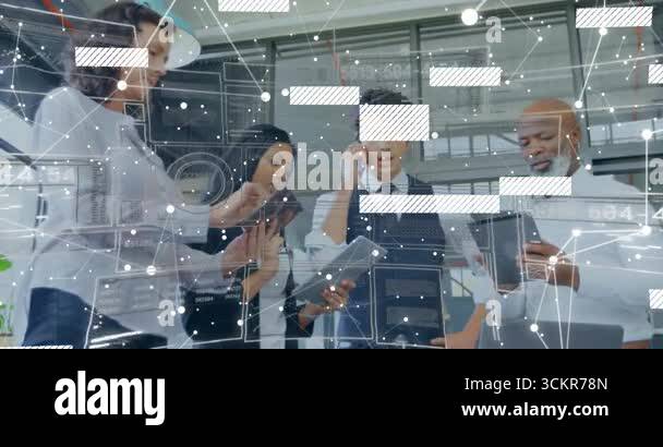 Leader scrolling tablet initiating network overlay while tech team reviewing data for decision ...