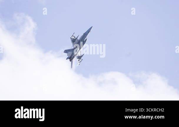 F-22 Raptor performs aerial maneuvers against a bright sky at Avalon ...