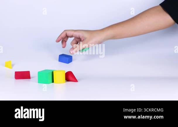 Hands arranging colorful blocks Stock Videos & Footage - HD and 4K ...