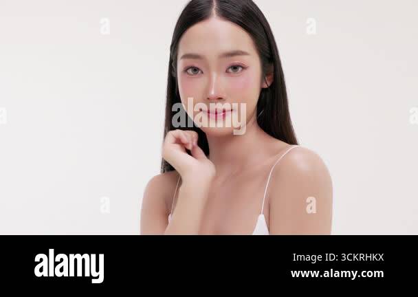 Skincare commercial video featuring a young Asian woman applying ...