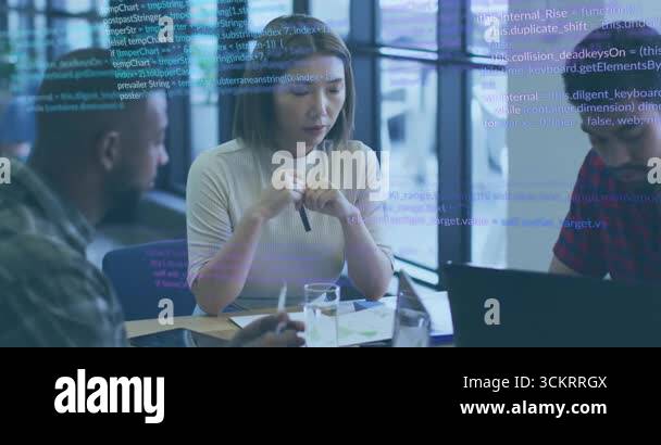 Colleagues reviewing code in conference room as woman asking question ...