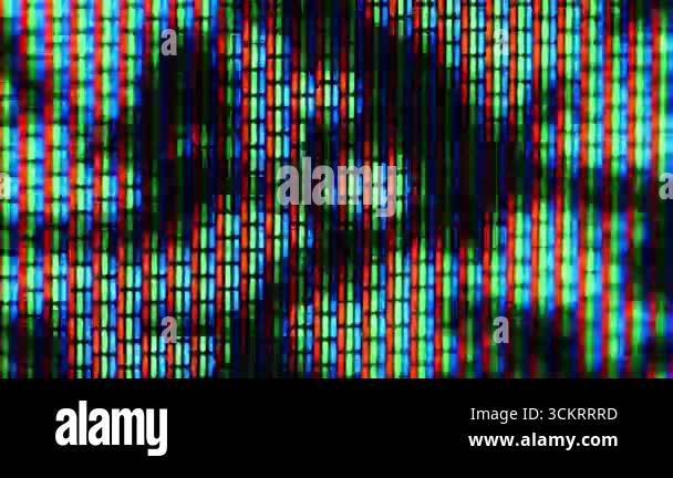 Close-up of an analog TV screen individual red, green, and blue pixels ...