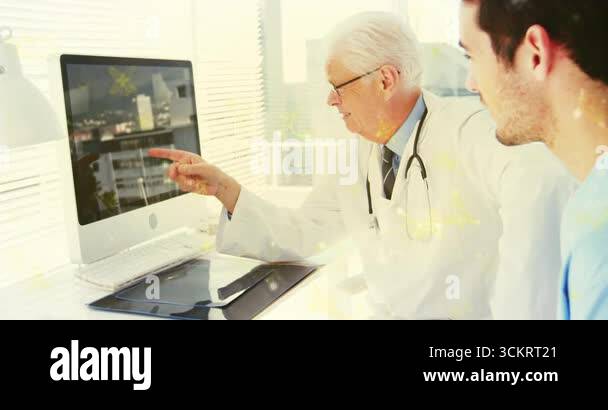 Doctor explaining animated scan results on monitor upon patient raising ...