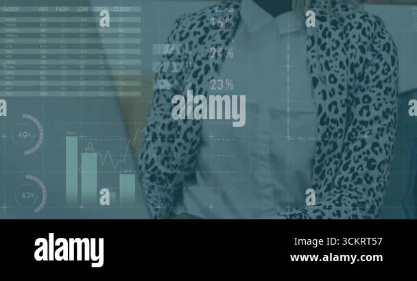 Business analyst typing on laptop and activating floating finance ...