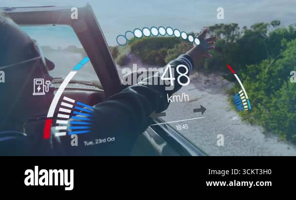 Woman extending arm during car acceleration for automotive demo with ...