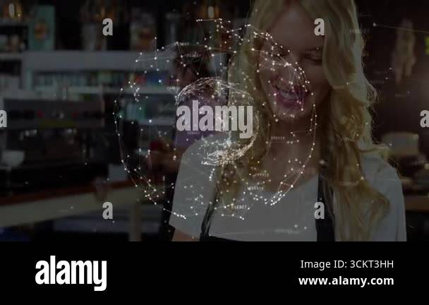 Female barista activating animated globe overlay on tablet for data visualization in cafe ...