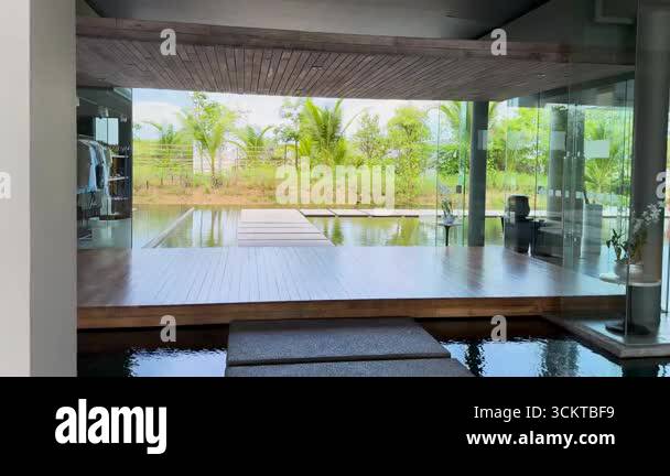 Serene resort view with water and greenery Stock Video Footage - Alamy