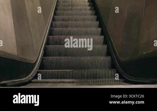 Empty moving escalator going up inside underground subway station. High quality 4k footage Stock ...