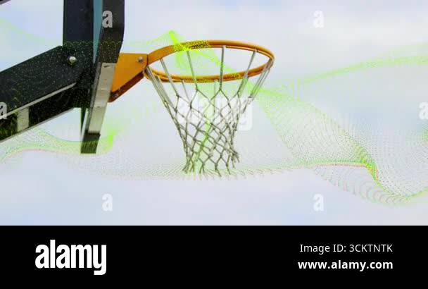 Stretched arm reaching up initiating ball arc hitting hoop scoring ...