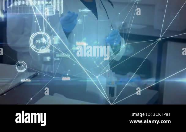 Gloved researcher pipetting sample as overlay pulses while colleague monitoring screen for ...