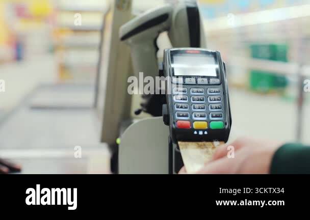 hand man entering pin code at grocery store or supermarket pay cash ...