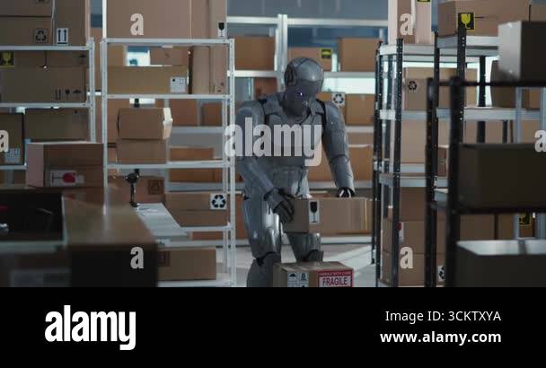 Cybernetic future robot worker carrying and sorting different boxes ...