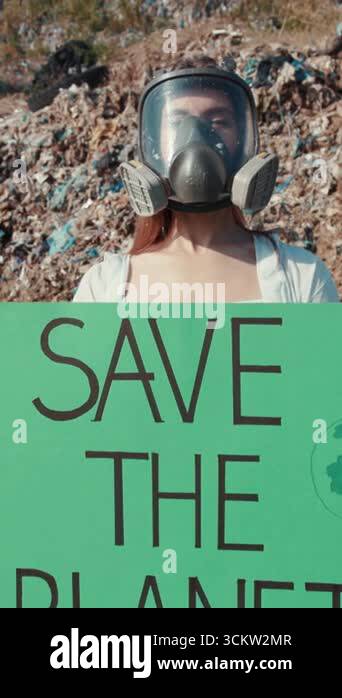A protester in a gas mask passionately advocates for essential ...