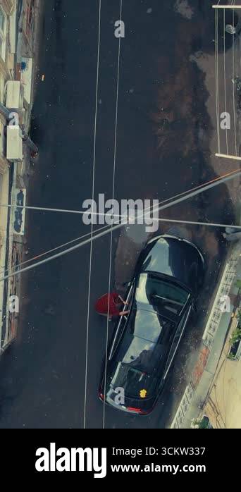 An impressive overhead shot captures a bustling urban intersection ...