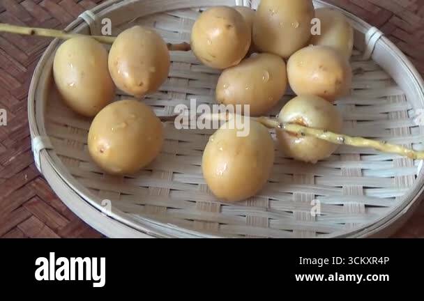 woman picking dates for lunch Stock Video Footage - Alamy