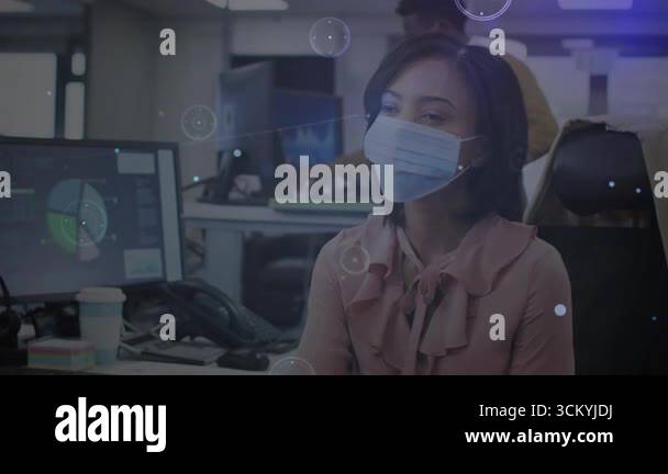 Mid adult woman studying pie chart on desk for data analysis generating ...
