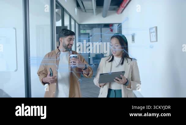 Office coworkers walking tapping tablet digital overlays appearing as woman explaining tech ...