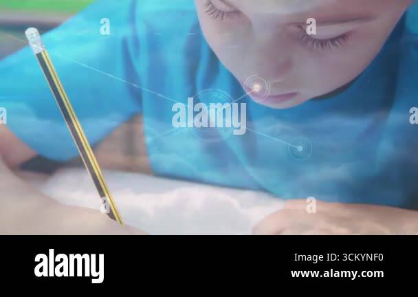 Student leaning with pencil writing on paper while network graphics ...