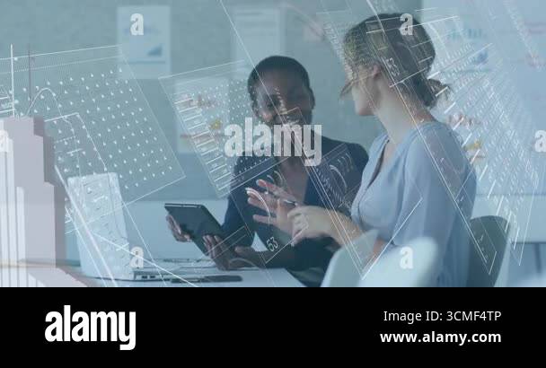 Professional women tapping tablet and revealing animated data charts ...