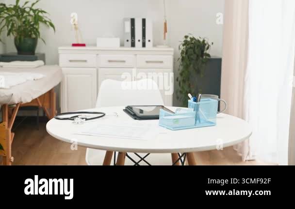 Clean and modern empty doctors office interior with a stethoscope ...