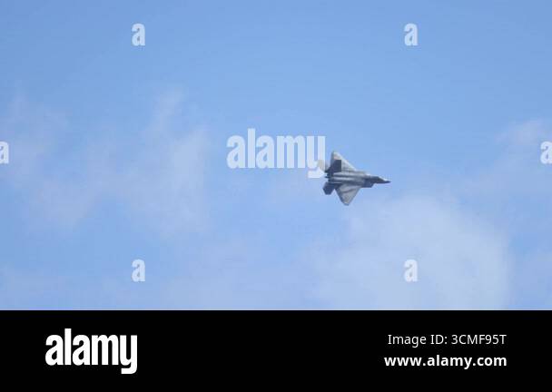 F-22 Raptor performs aerial maneuvers against a clear sky at Avalon ...