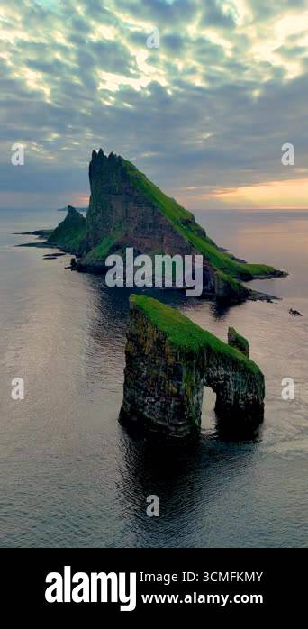 Experience the breathtaking beauty of Drangarnir cliffs in the Faroe ...