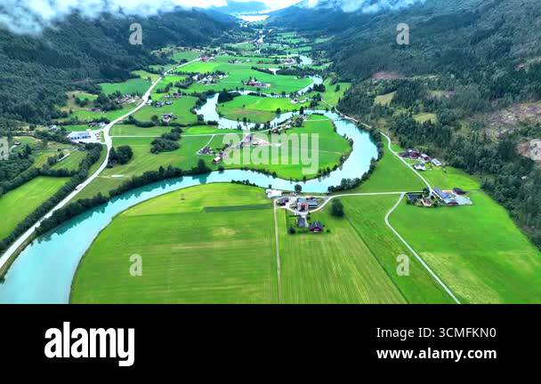 Experience the stunning beauty of Stryn, Norway, where vibrant green ...