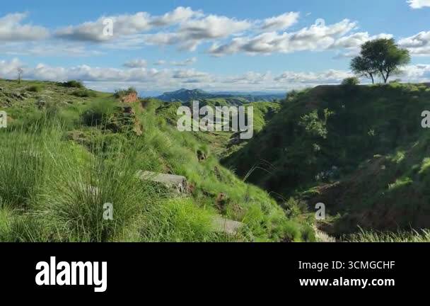 Beautiful green valley between two mountains in Sohawa Punjab Pakistan ...