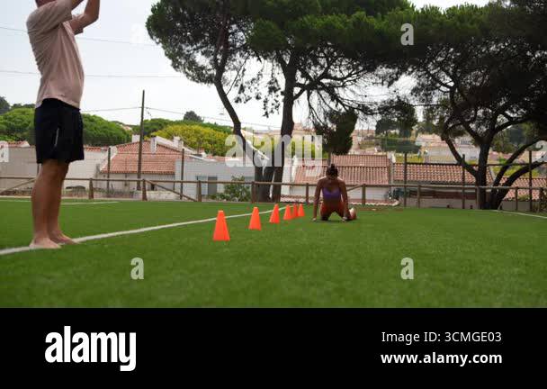 An energizing outdoor workout combining agility drills with cones and ...