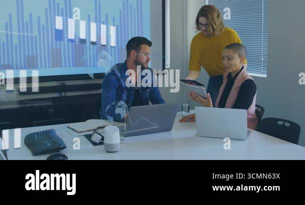 Team using devices in business meeting, animating AR charts ...