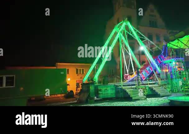 A popular attraction known as a pirate ship and a fairground merry go ...