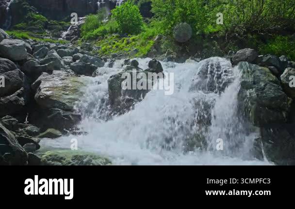The flow of water in a mountain river. High quality 4k footage Stock ...