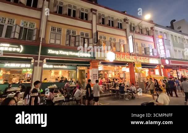 Singapore- 23 Aug 2025: Crowds visit to Liang Seah Street in Singapore ...