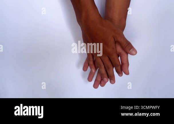 A hand demonstrates a hand-washing motion, promoting hygiene and ...