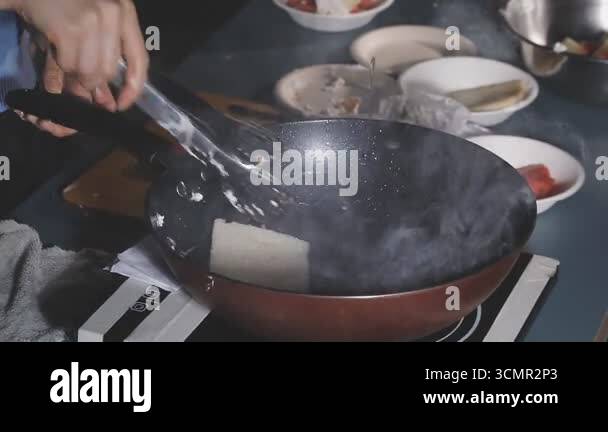 chef preparing delicious cooking in the kitchen. cooking concept Stock ...