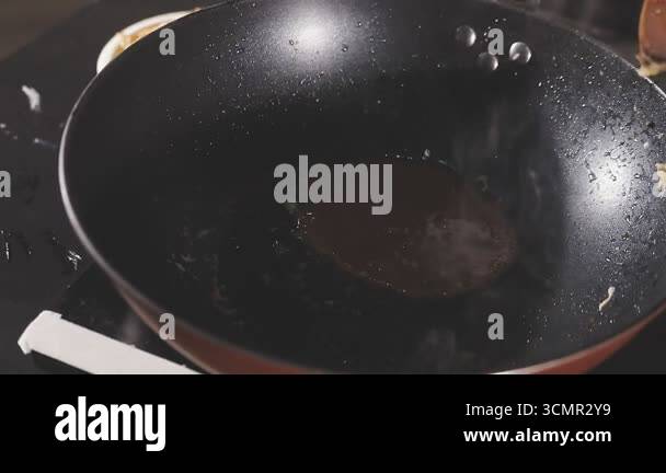 Frying in pan Stock Videos & Footage - HD and 4K Video Clips - Alamy