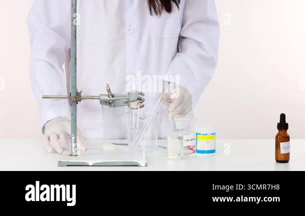 Chemical reaction demonstration in a laboratory setting Stock Video ...