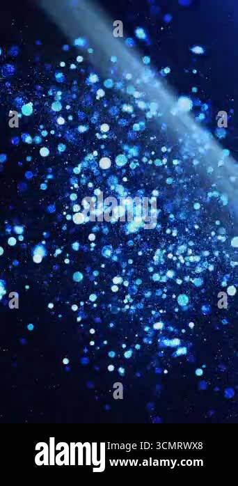 Animation of blue lights over glowing blue and white particles floating ...