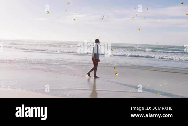 Man stepping into frame walking shoreline showcasing digital star ...