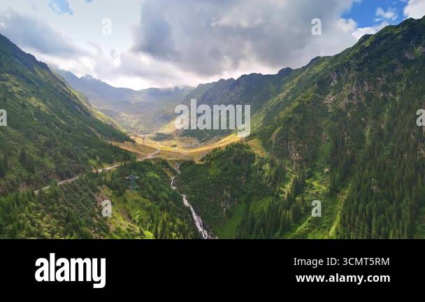 Fantastic verdant mountains in Romania from drone footage. Grey ...