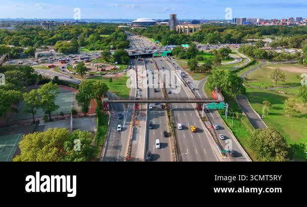 Crazy traffic on the roads at daytime. Drone footage over the highways ...